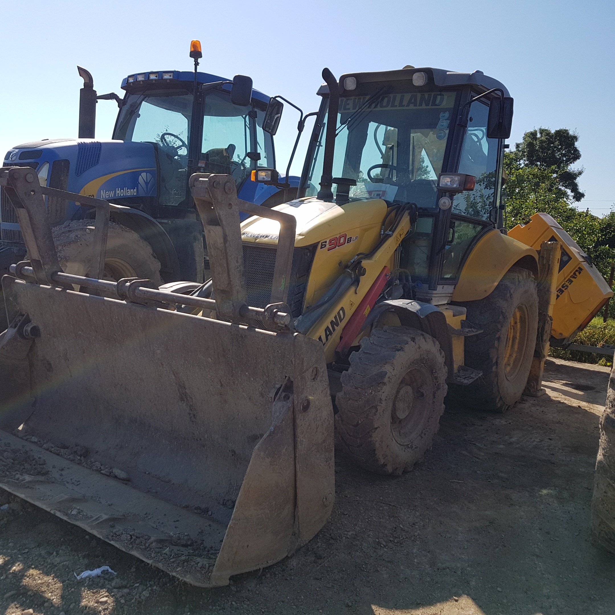 Utilaj constructii buldoexcavator New Holland LB90 - Afaceri in agricultura